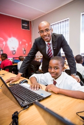 Adapt IT CEO Sbu Shabalala and Zwakele Primary student – SA Study